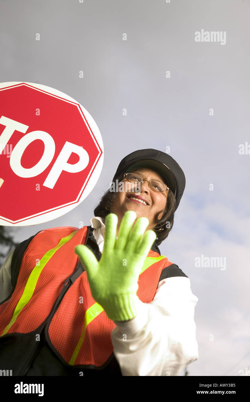 A female crossing guard at work Stock Photo - Alamy