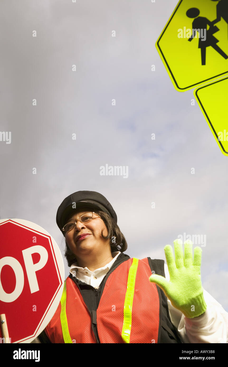 A female crossing guard at work Stock Photo - Alamy