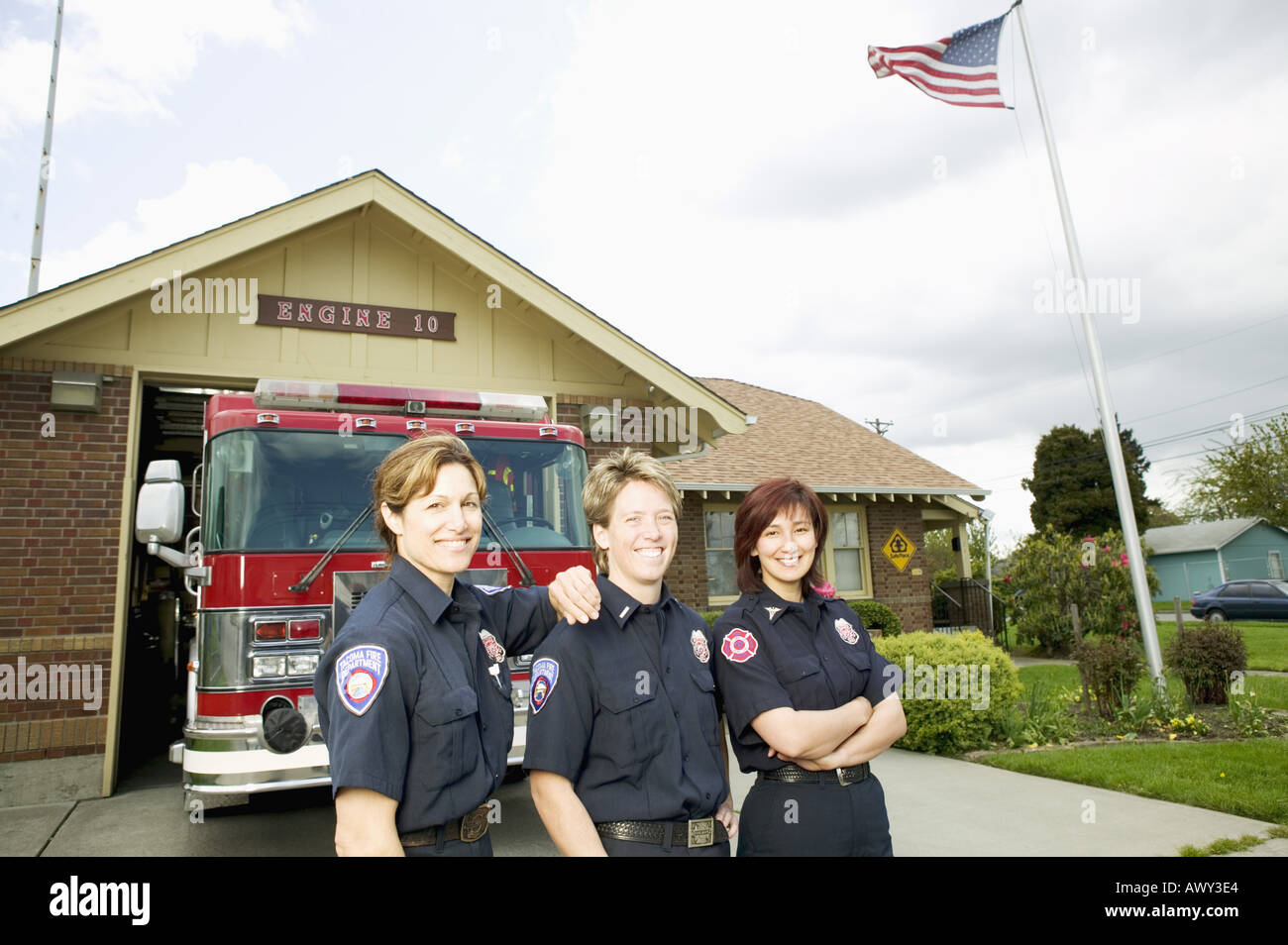 Portrait of three firefighters Stock Photo - Alamy