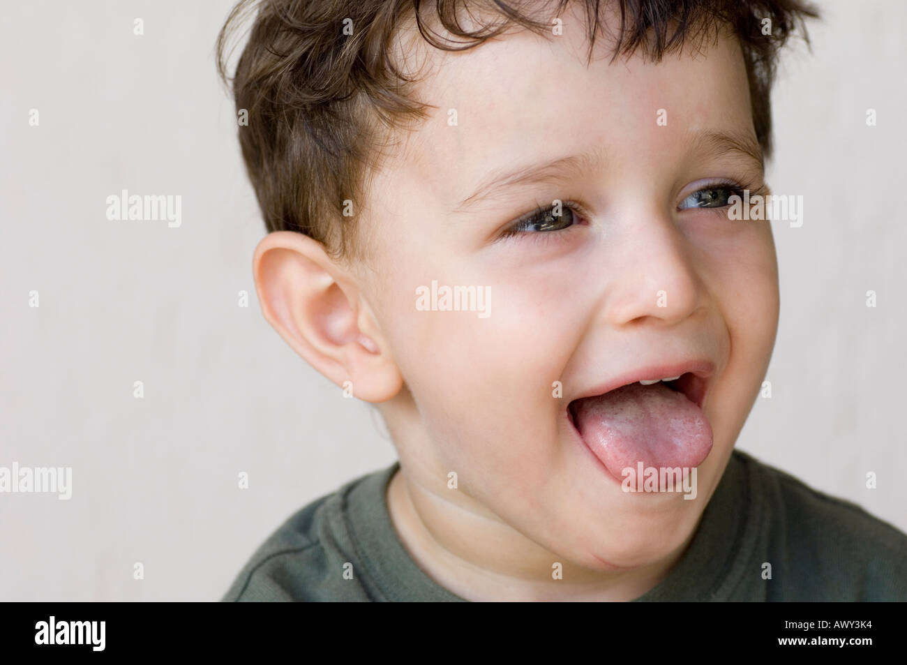 cheeky young boy Stock Photo - Alamy