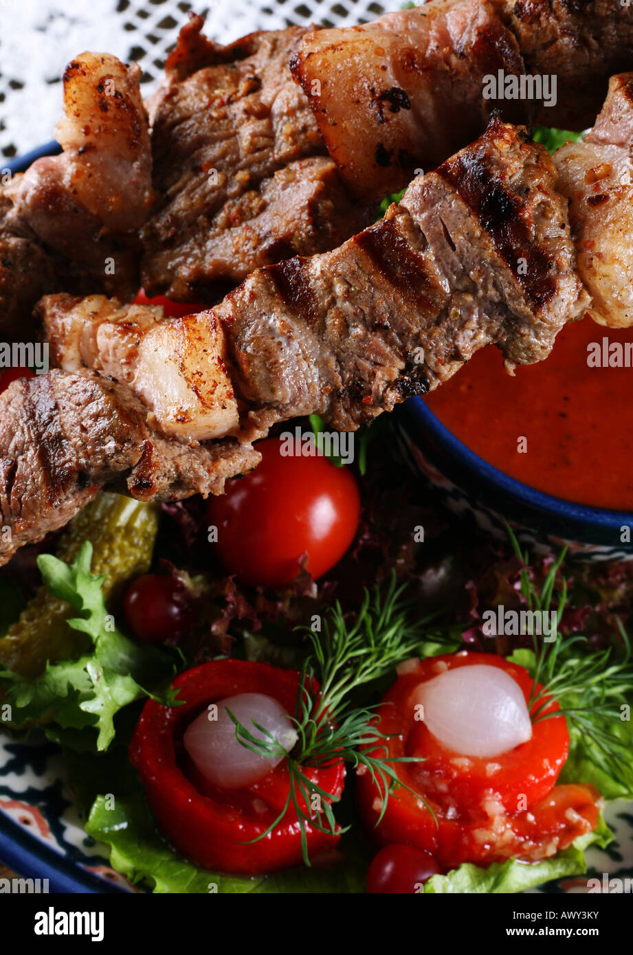 Fried kebab meat with red pepper Stock Photo - Alamy