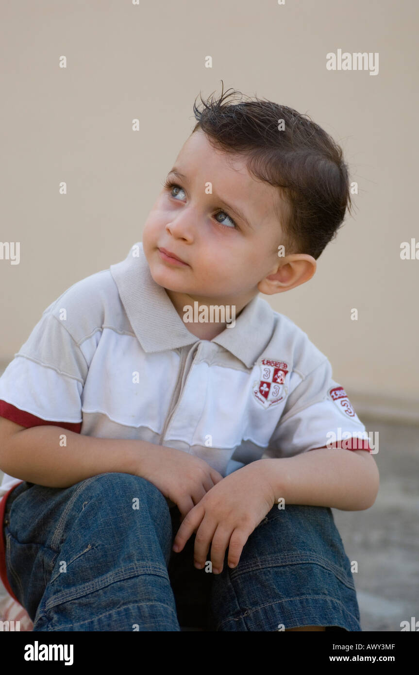 baby boy sitting down Stock Photo - Alamy