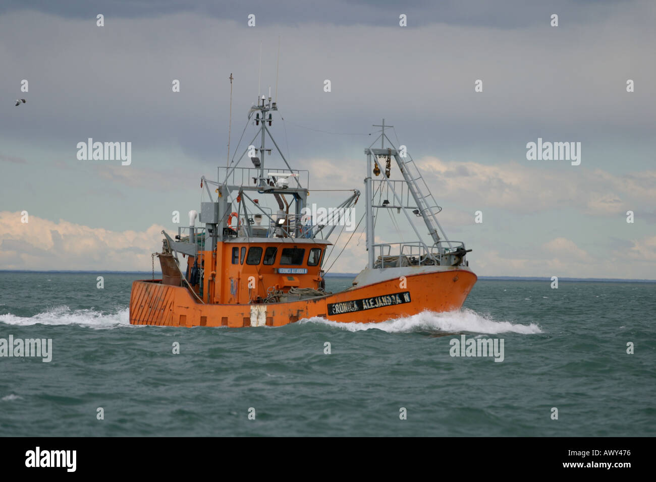 Fishing trawler at sea Stock Photo - Alamy