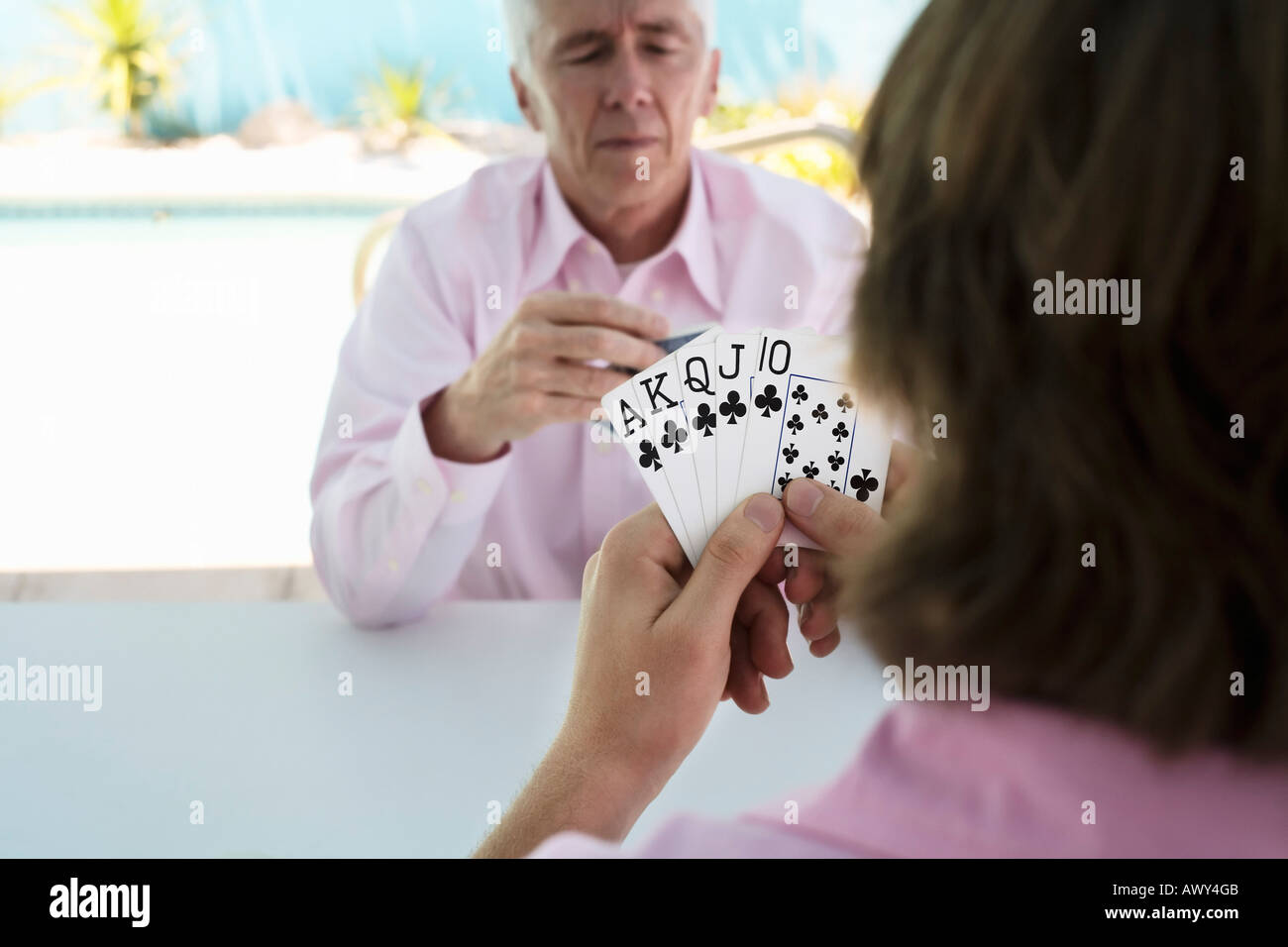 Mature Couple Playing Cards Outdoors High Resolution Stock Photography ...