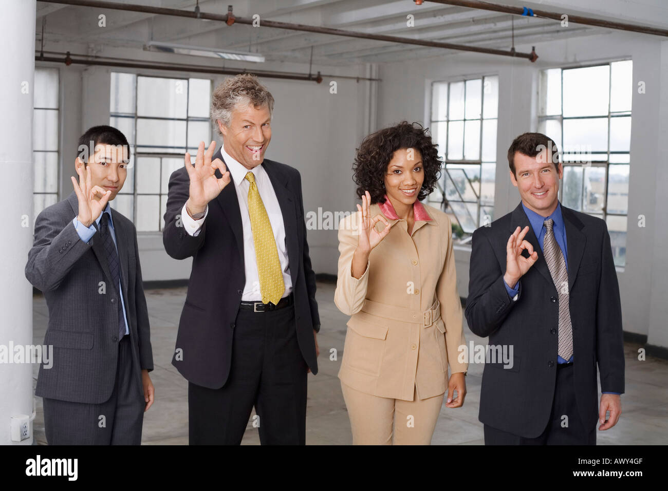 Group Portrait of Business People Making Hand Gesture Stock Photo - Alamy