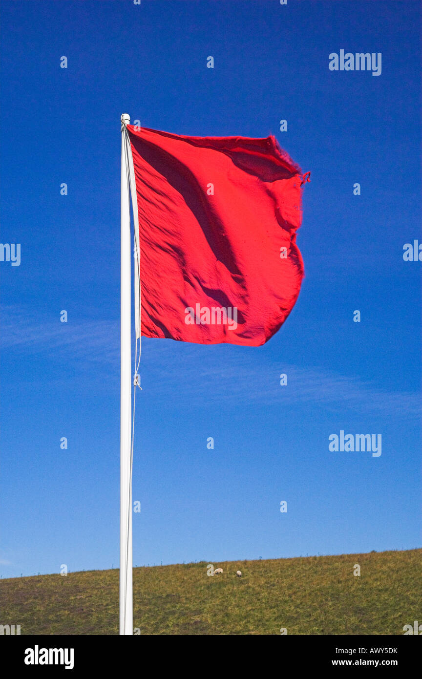 Red warning flag on a military firing range in County Durham, England ...