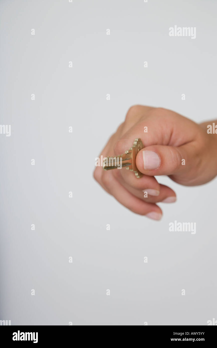 Woman s hand with key MODEL RELEASE 883 Stock Photo - Alamy