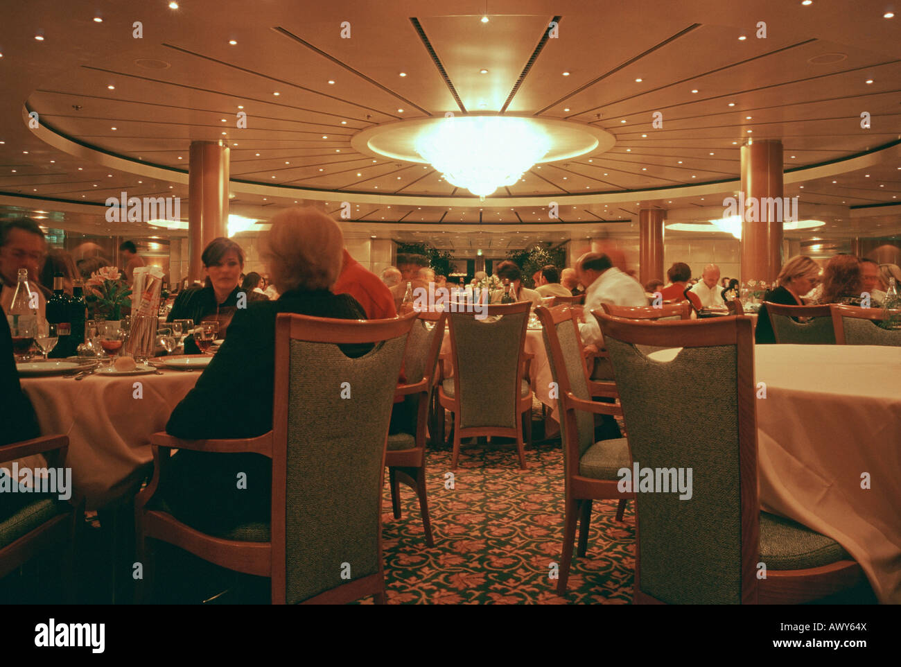 customers eating in the dining room of the cruise ship Costa Victoria ...