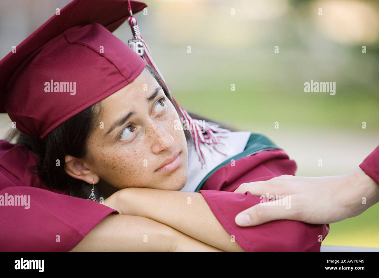 Graduate Being Comforted Stock Photo - Alamy