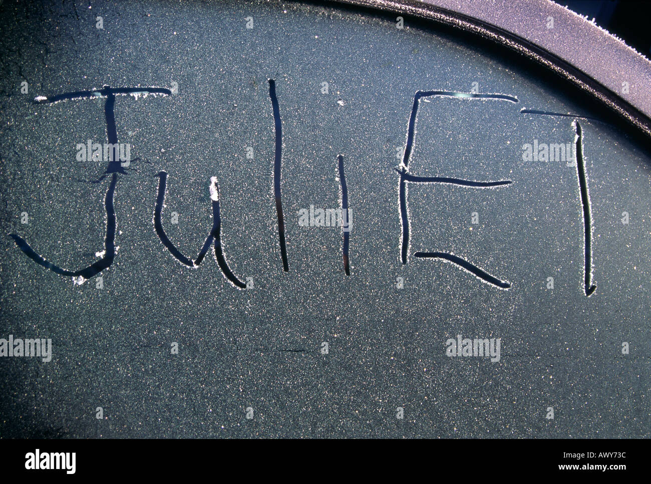 Name written in frost on car window Stock Photo - Alamy