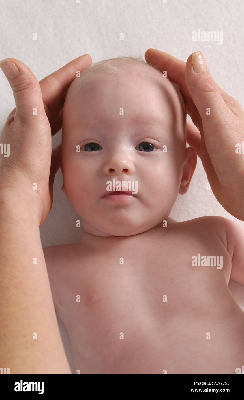 Baby head massage hi-res stock photography and images - Alamy