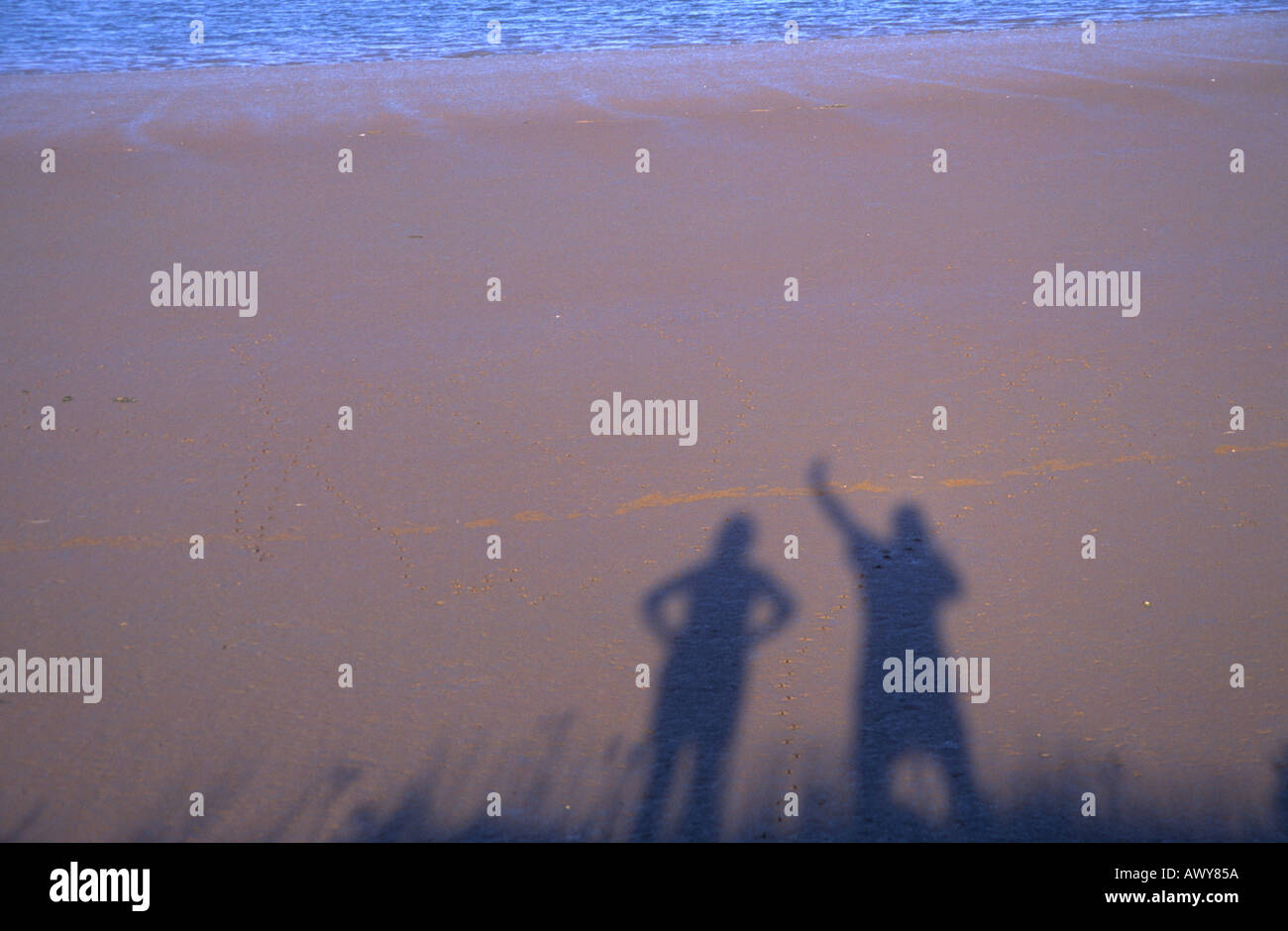 Long shadows two people cast hi-res stock photography and images - Alamy
