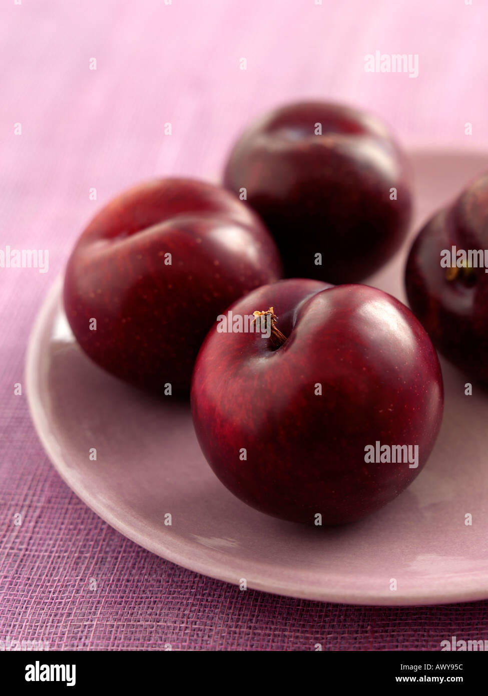 Four plums hi-res stock photography and images - Alamy