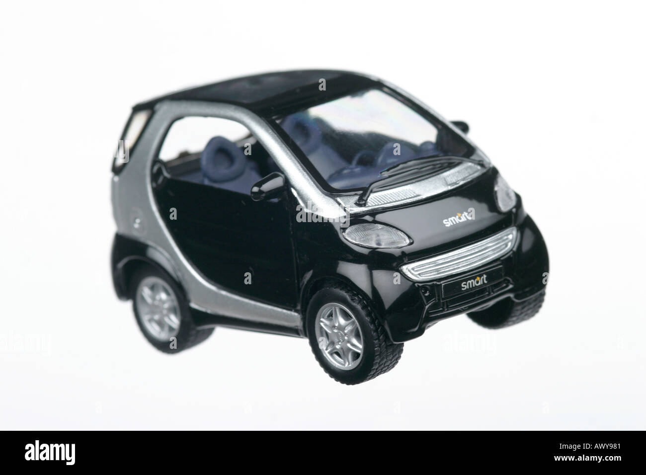 Smart car cut out on a white background Stock Photo - Alamy