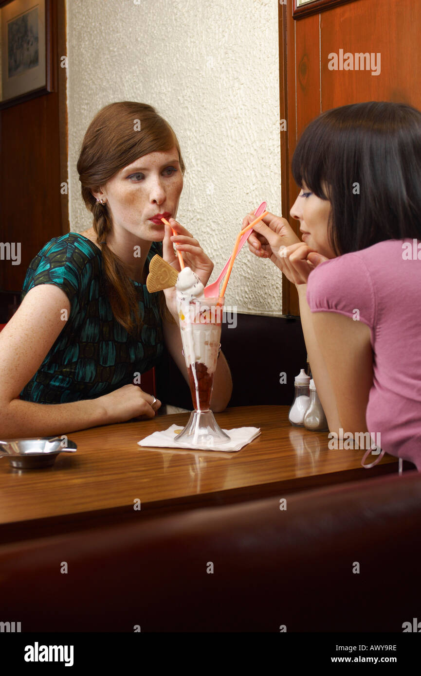 Sipping milk shake hi-res stock photography and images - Alamy