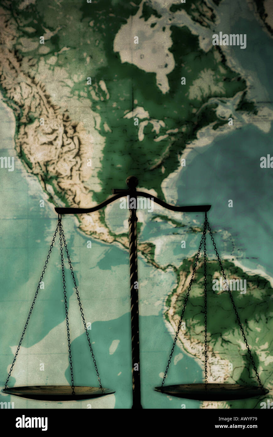 Scales of justice in front of a map of North Central and South America ...