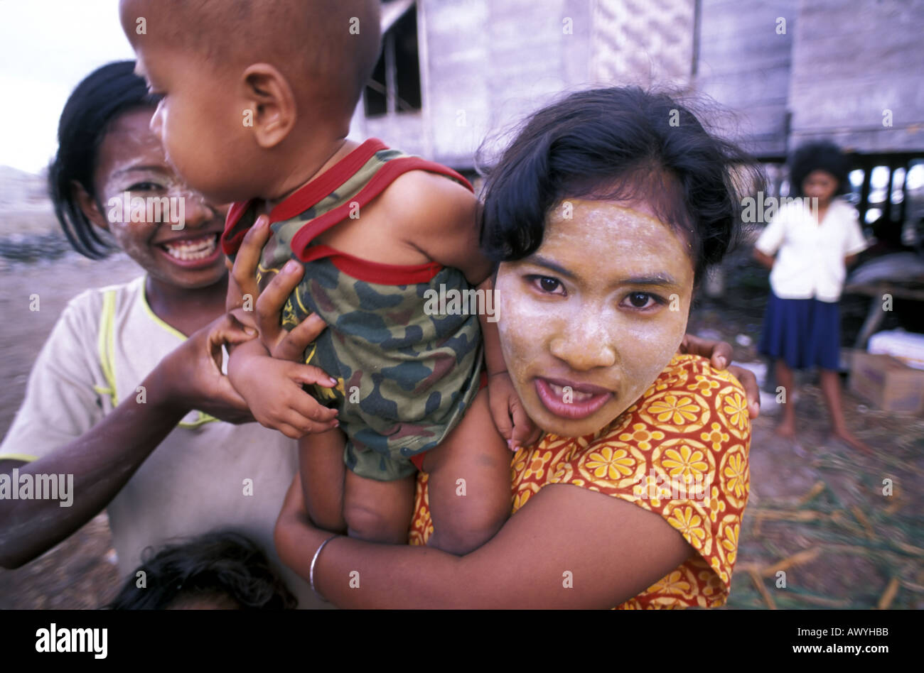 Young mother in the sea gypsy Bajau stilt village of Sampela built on ...