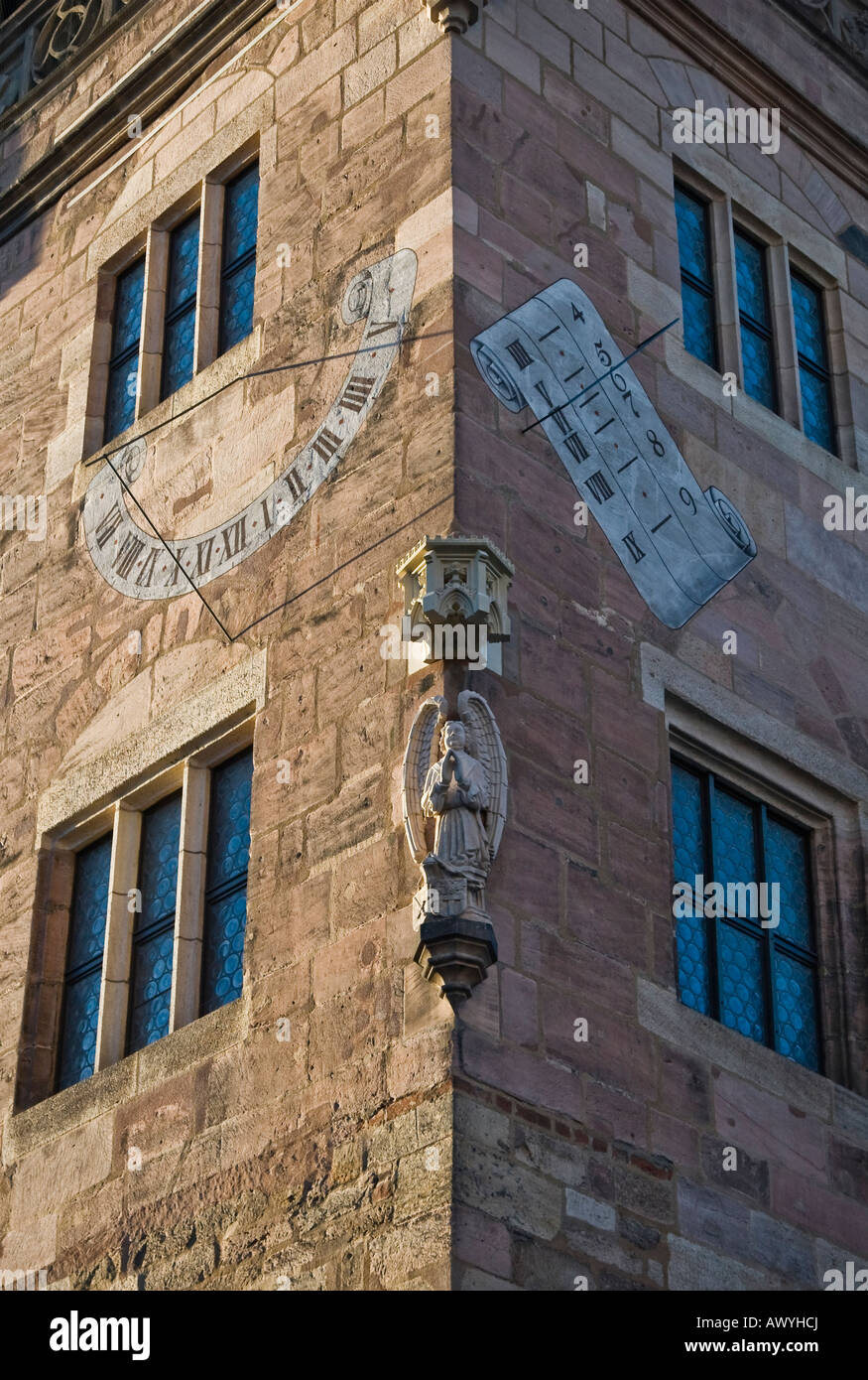 Building detail with daily and monthly sundials Nuernberg Germany Stock ...