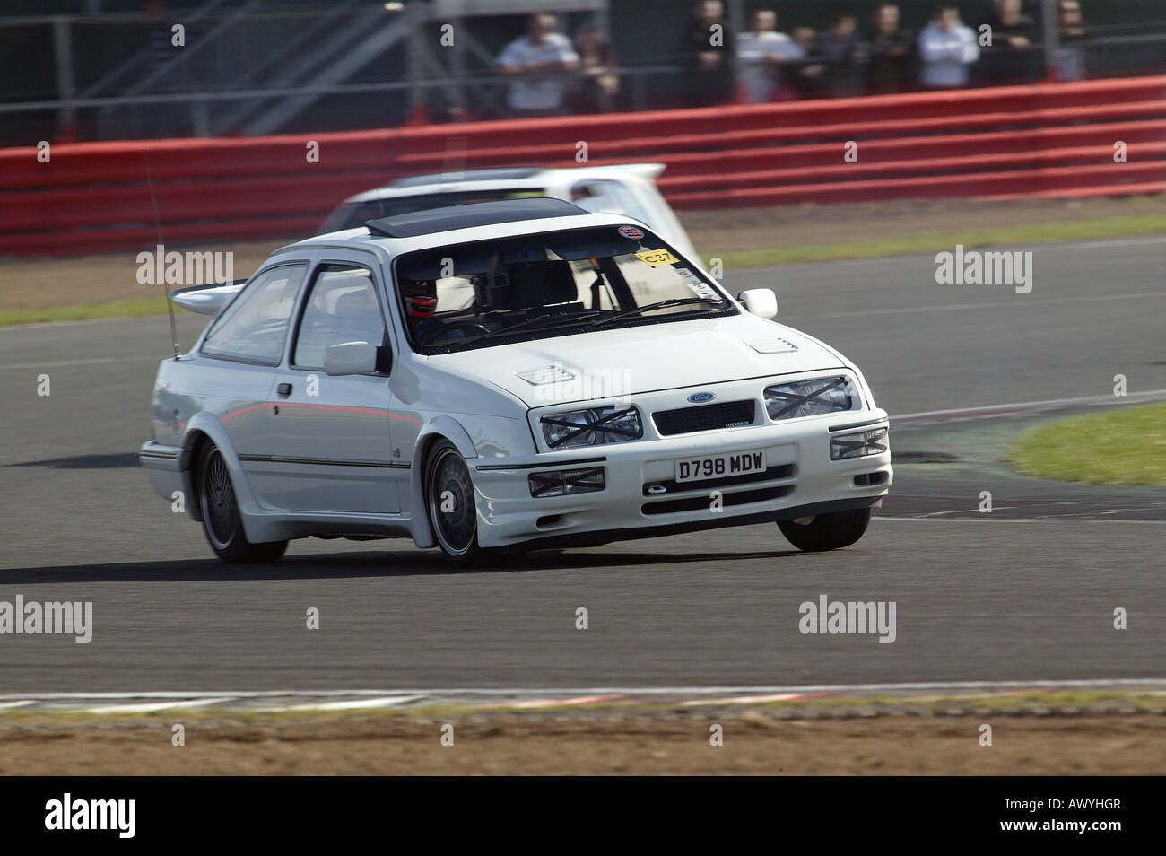 Cosworth 3 door racing at Silverstone circuit Stock Photo - Alamy