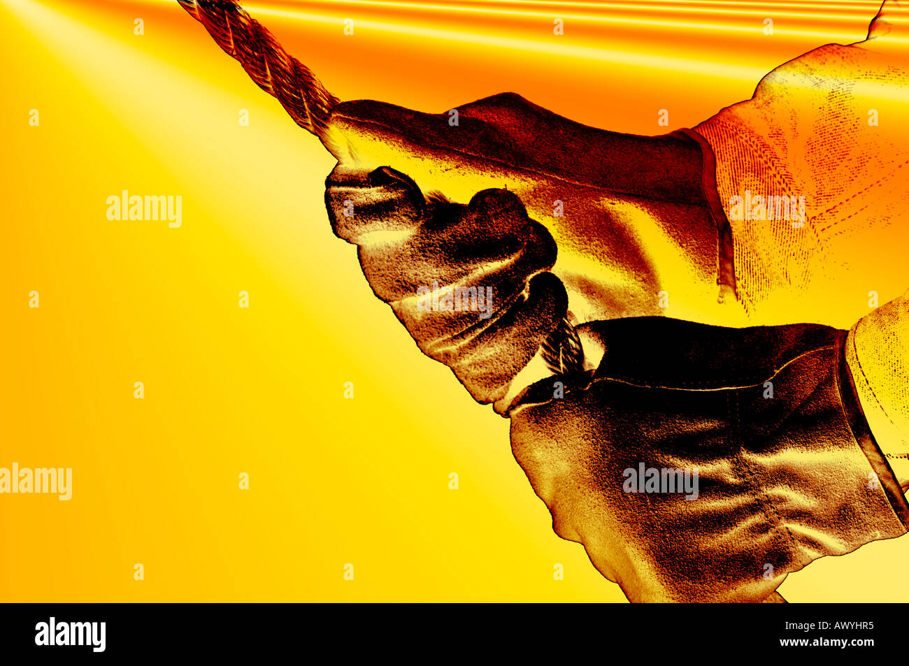 closeup of leather gloves holding heavy rope Stock Photo - Alamy