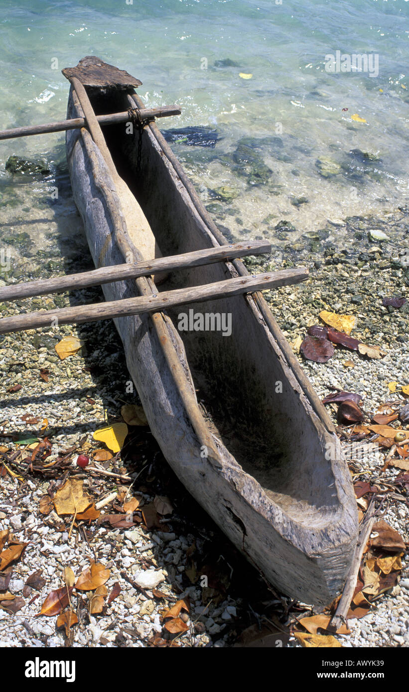 Wooden canoe roughly hewn from a single tree trunk, Efate, Vanuatu ...
