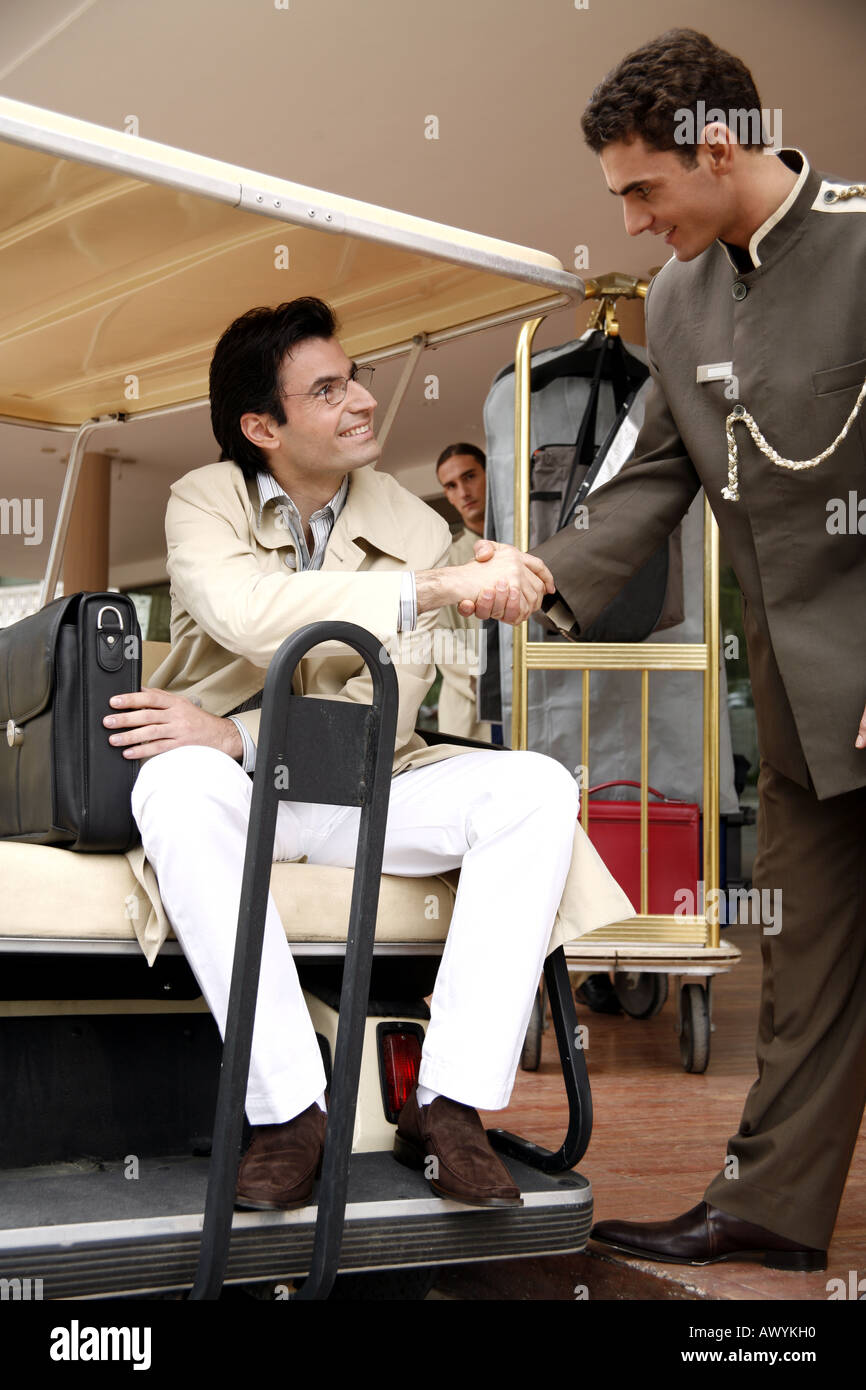 Business man arrive hotel check hi-res stock photography and images - Alamy