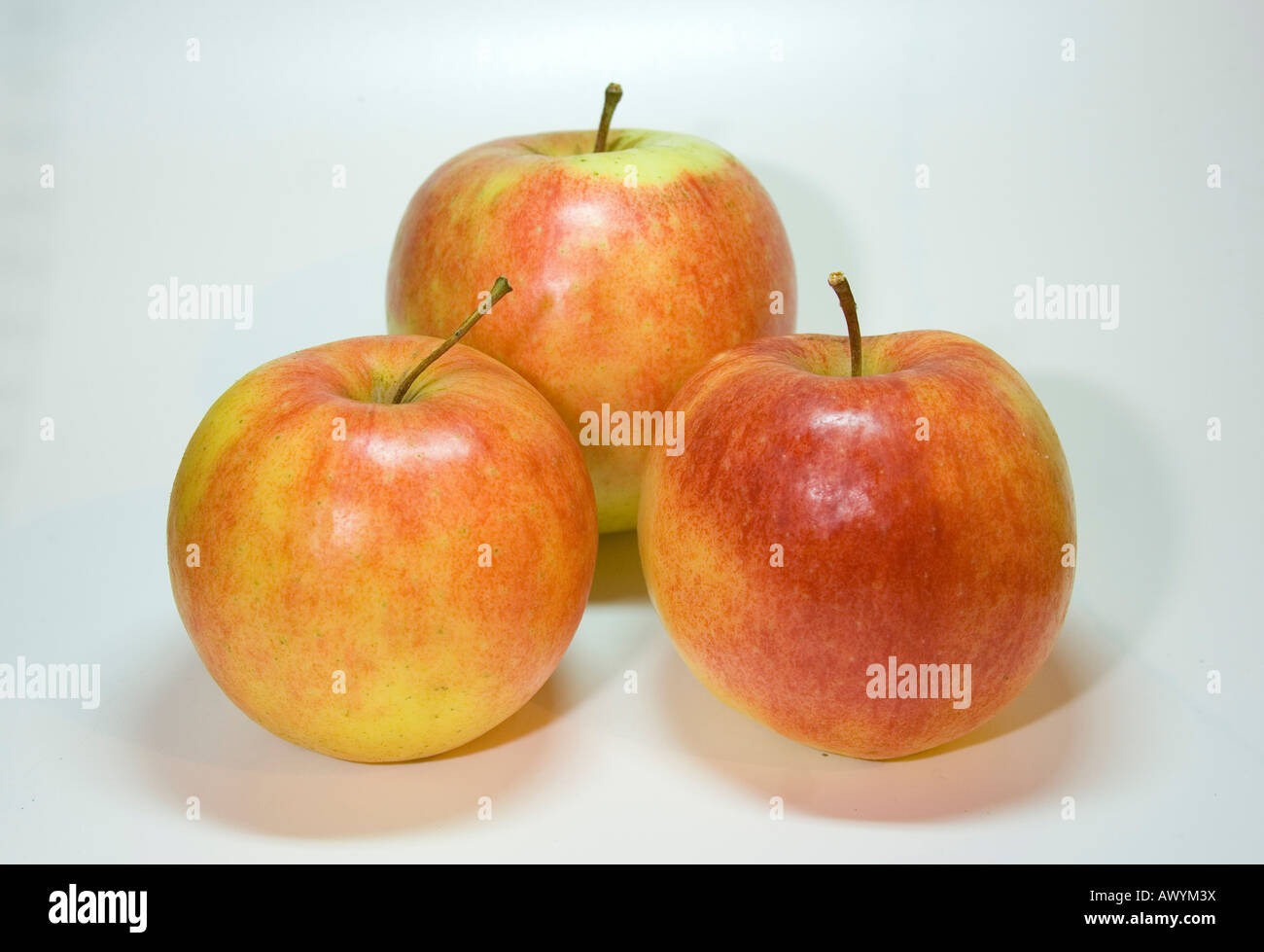 Three apples isolated on white Stock Photo - Alamy