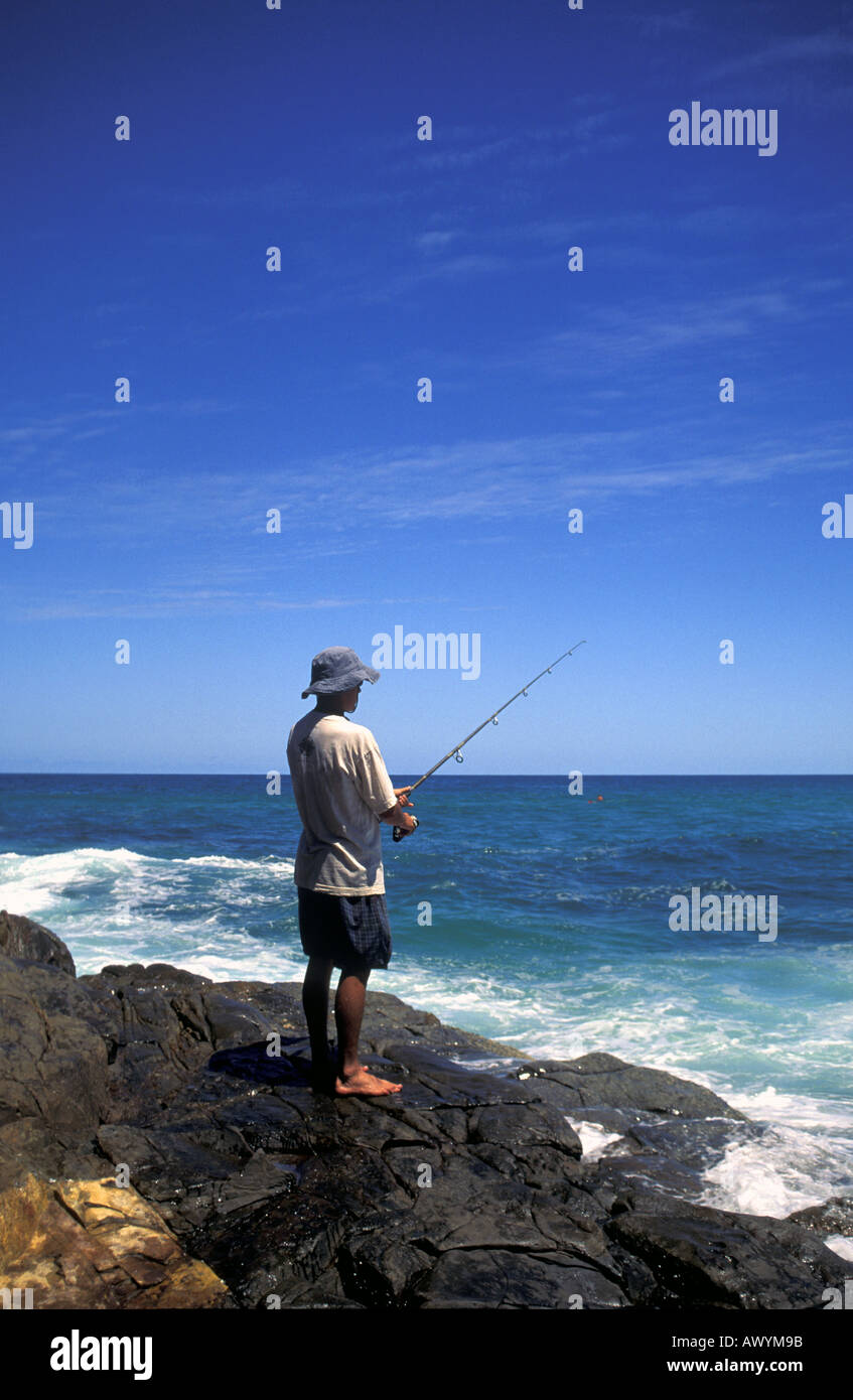 Man sea fishing angling off rocks hi-res stock photography and images ...
