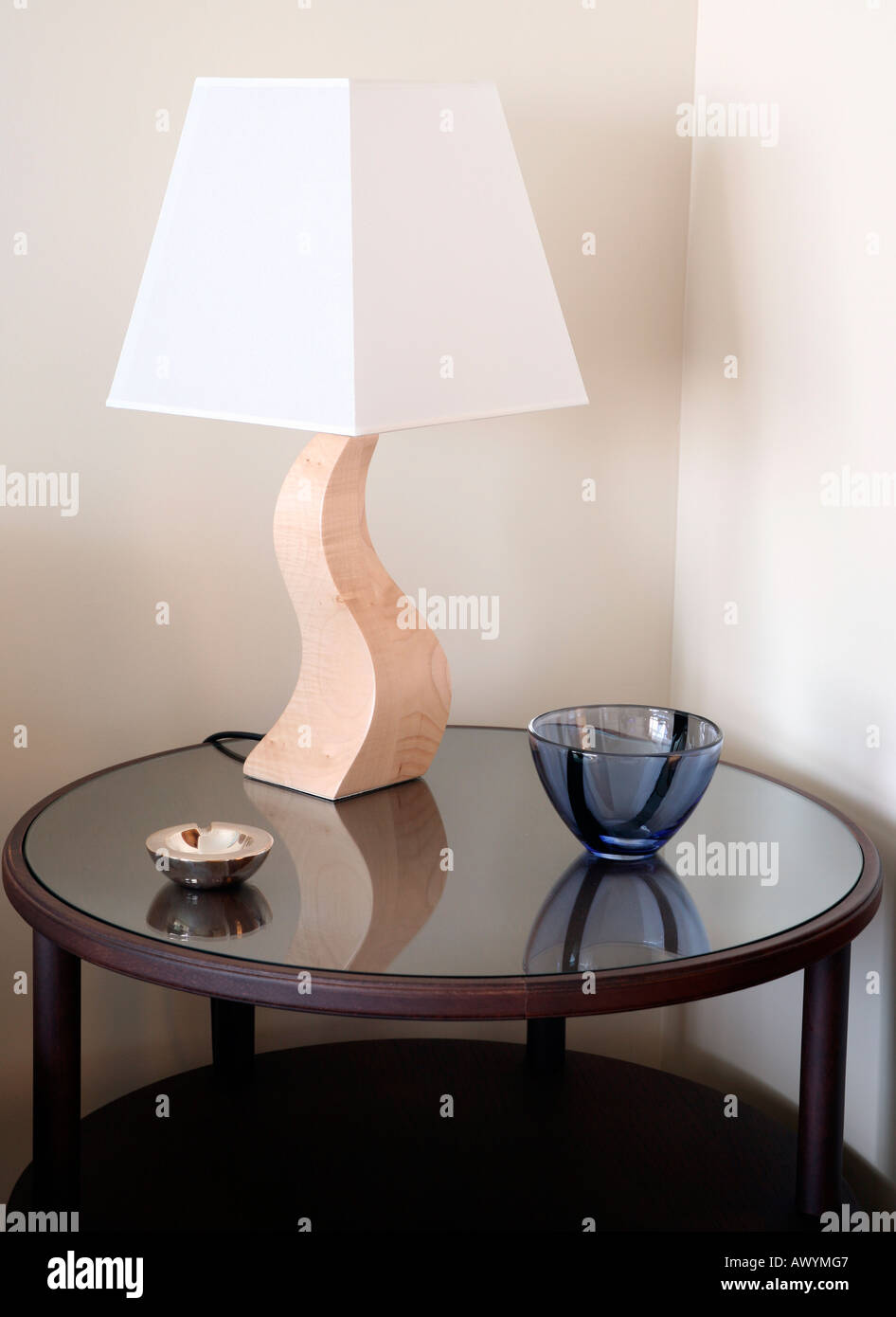 Sidetable with modern lamp Stock Photo - Alamy