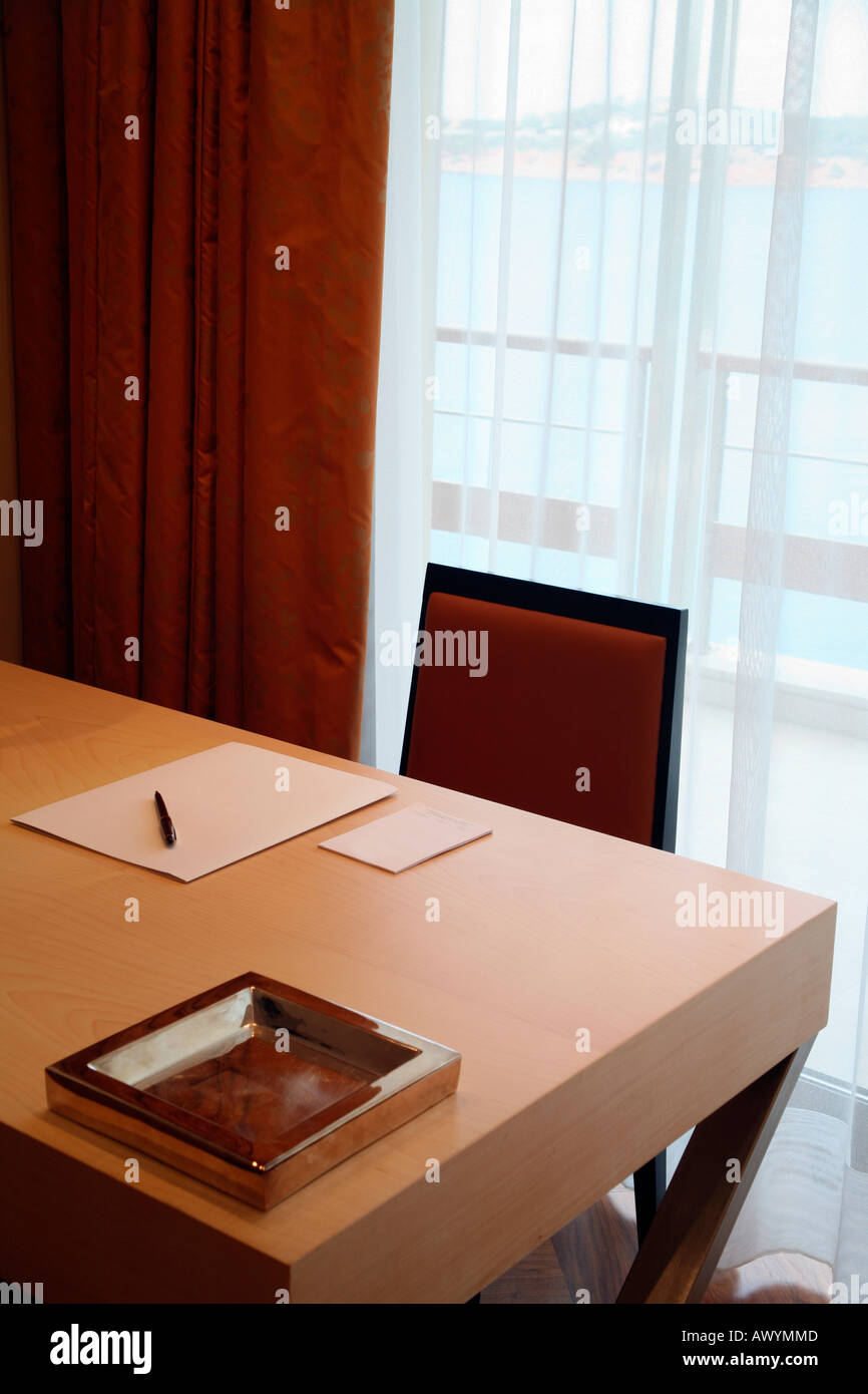 Desk with writing pad and pen Stock Photo - Alamy