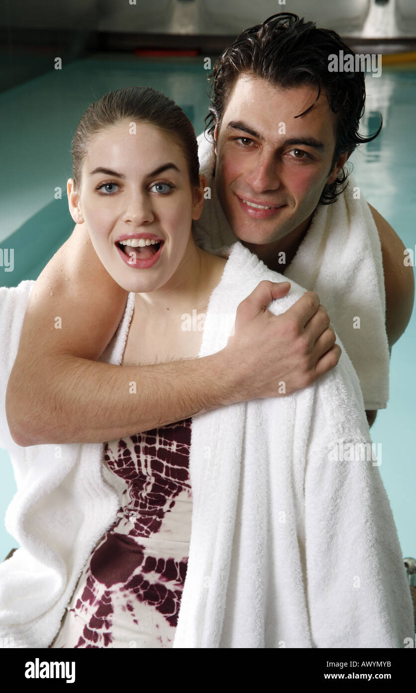 Young adult couples in swimming pool hi-res stock photography and ...