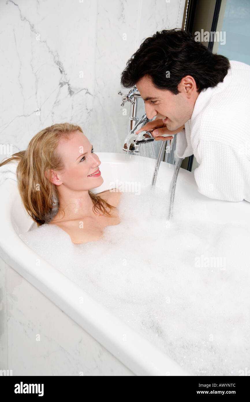 Couple enjoying bubble bath together hi-res stock photography and ...
