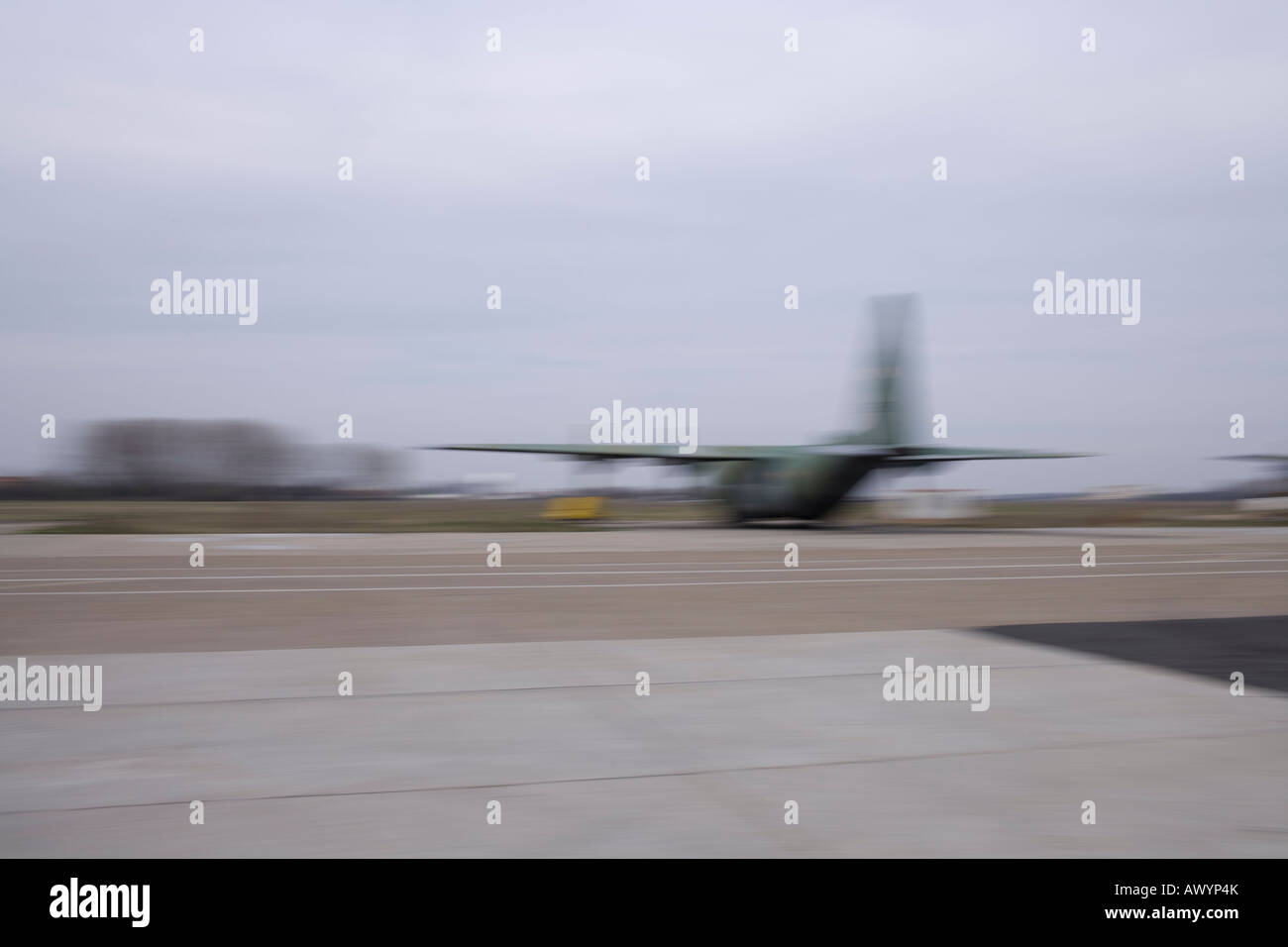 blurry picture of an airplane taking of from the runway Stock Photo - Alamy