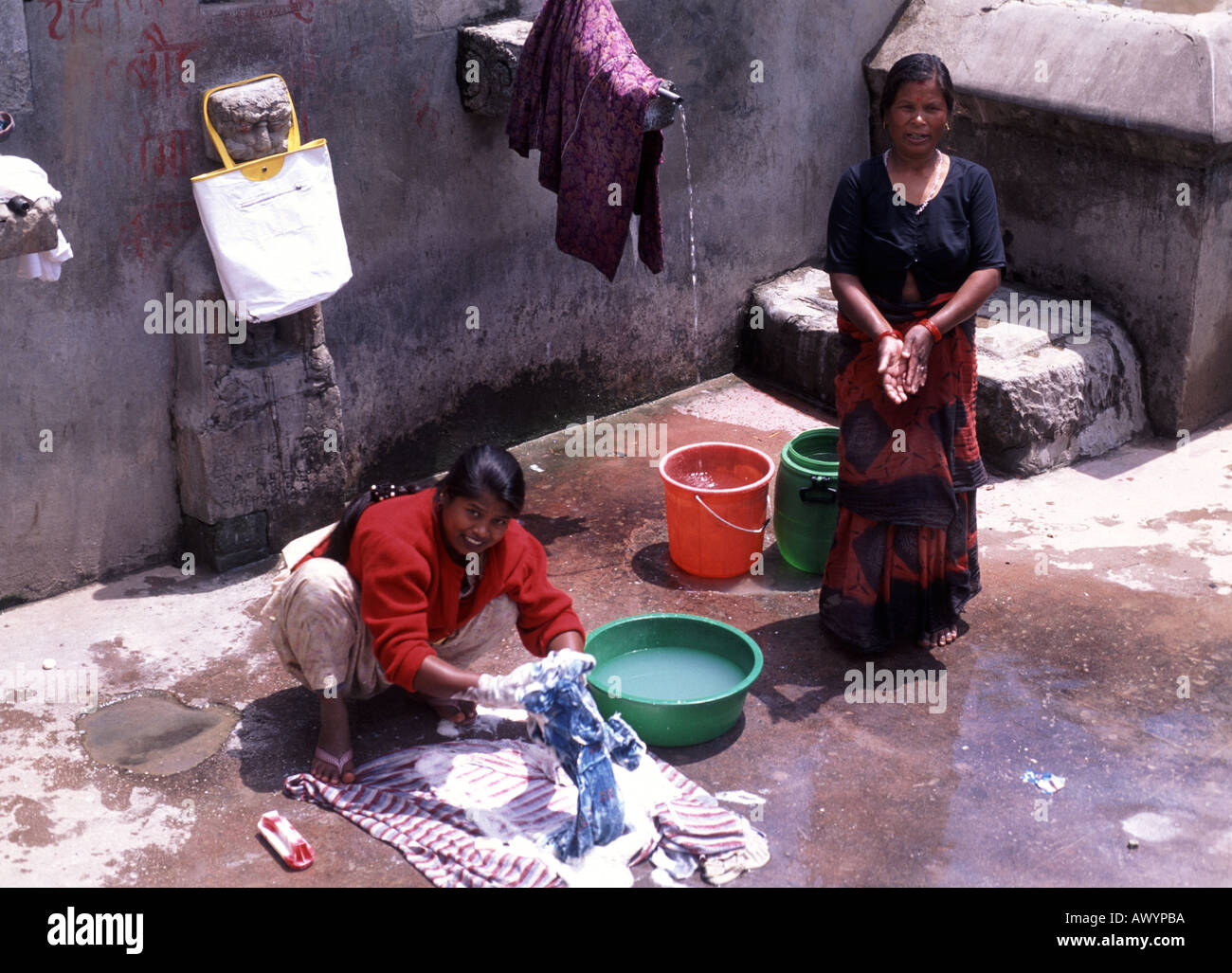 Women washing clothes in Nepal Stock Photo - Alamy