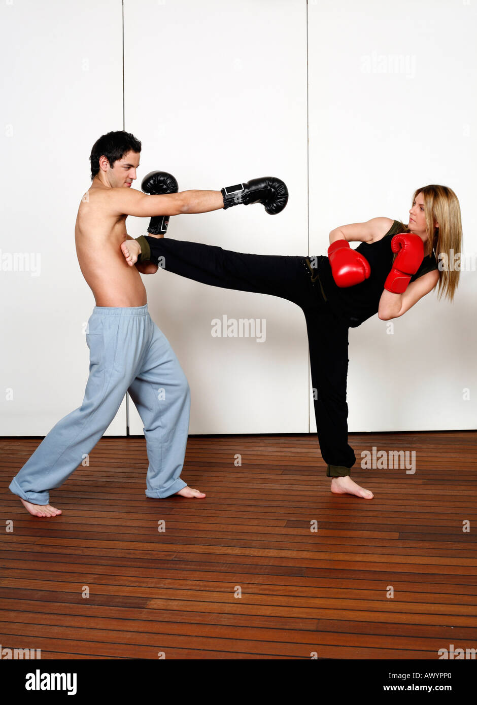 Straight right hand punch of Active Tae Bo and side kick Stock Photo ...