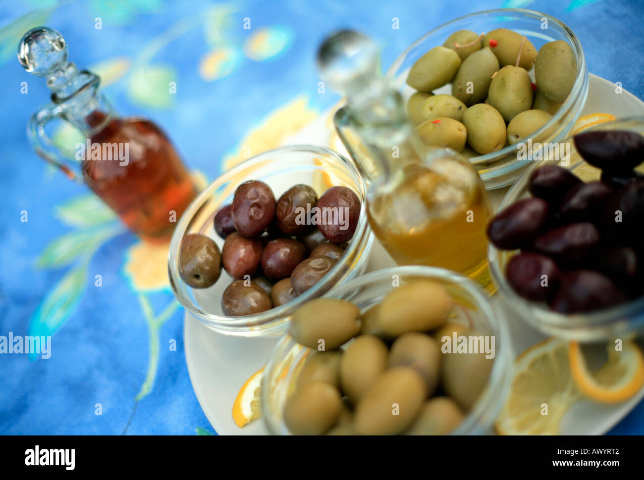 Assortment of olives with oil and vinegar Stock Photo - Alamy