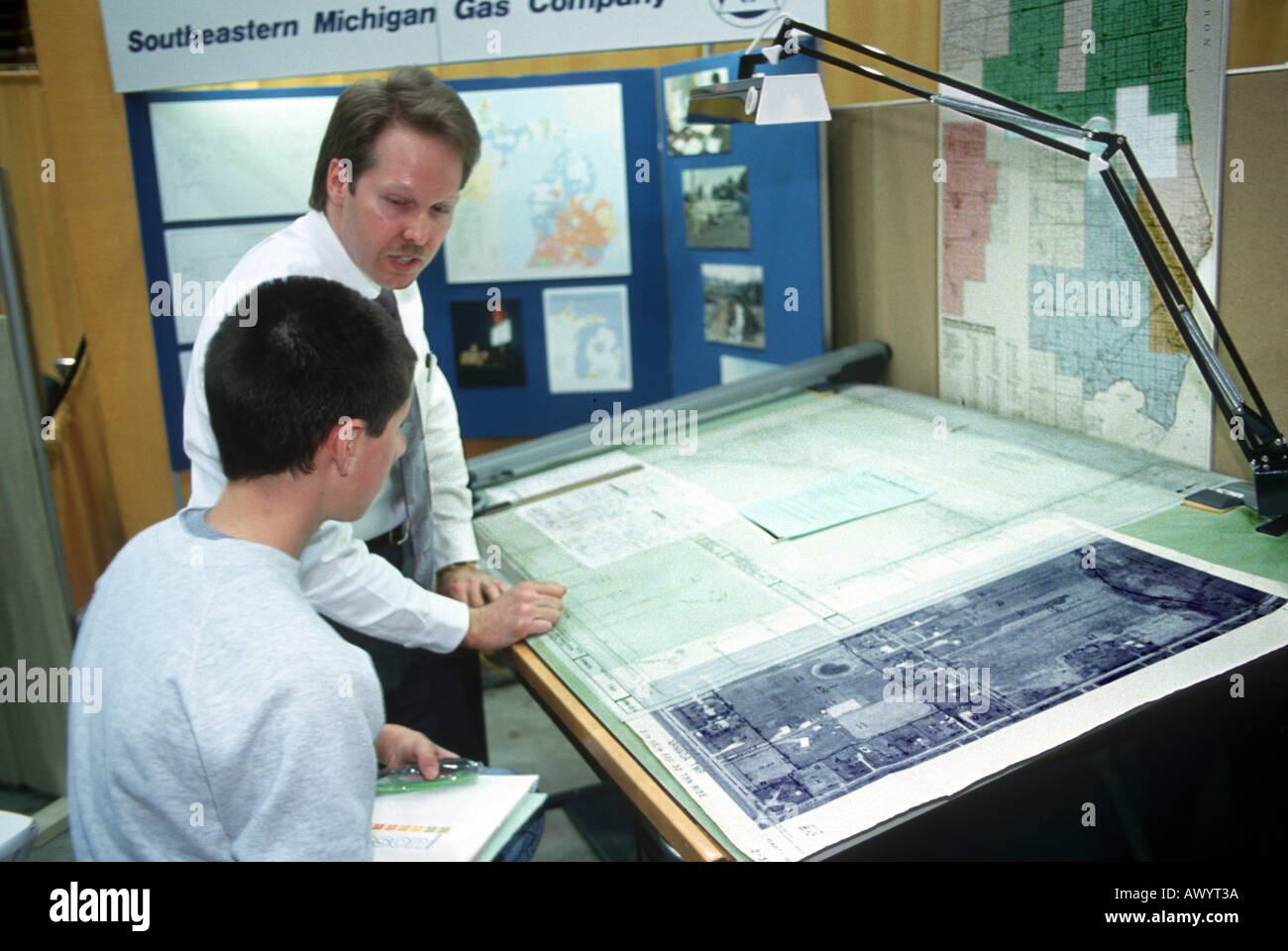 Male Student learns with instructor learning drafting drawing cad Stock ...