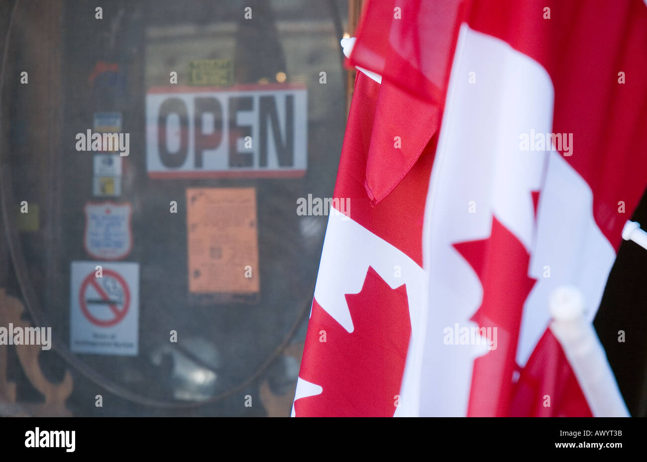 Canadian flag and "open" sign in Collingwood, Ontario, Canada Stock ...