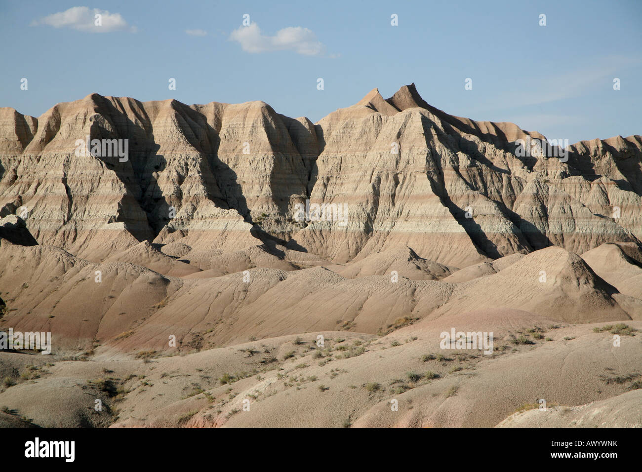 The Badlands National Park in South Dakota showing striated geology as ...