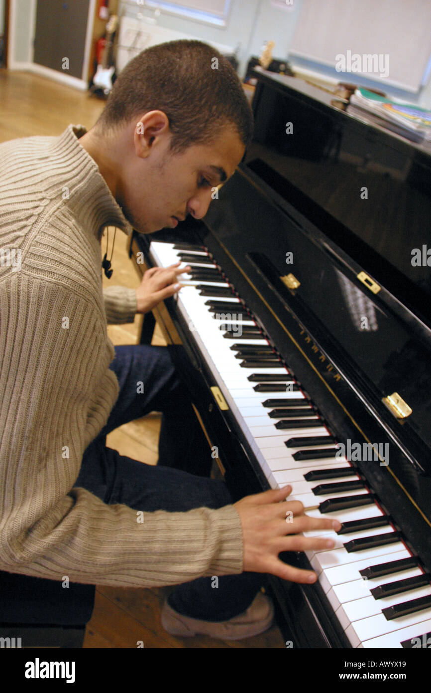 Young hands study piano hi-res stock photography and images - Alamy