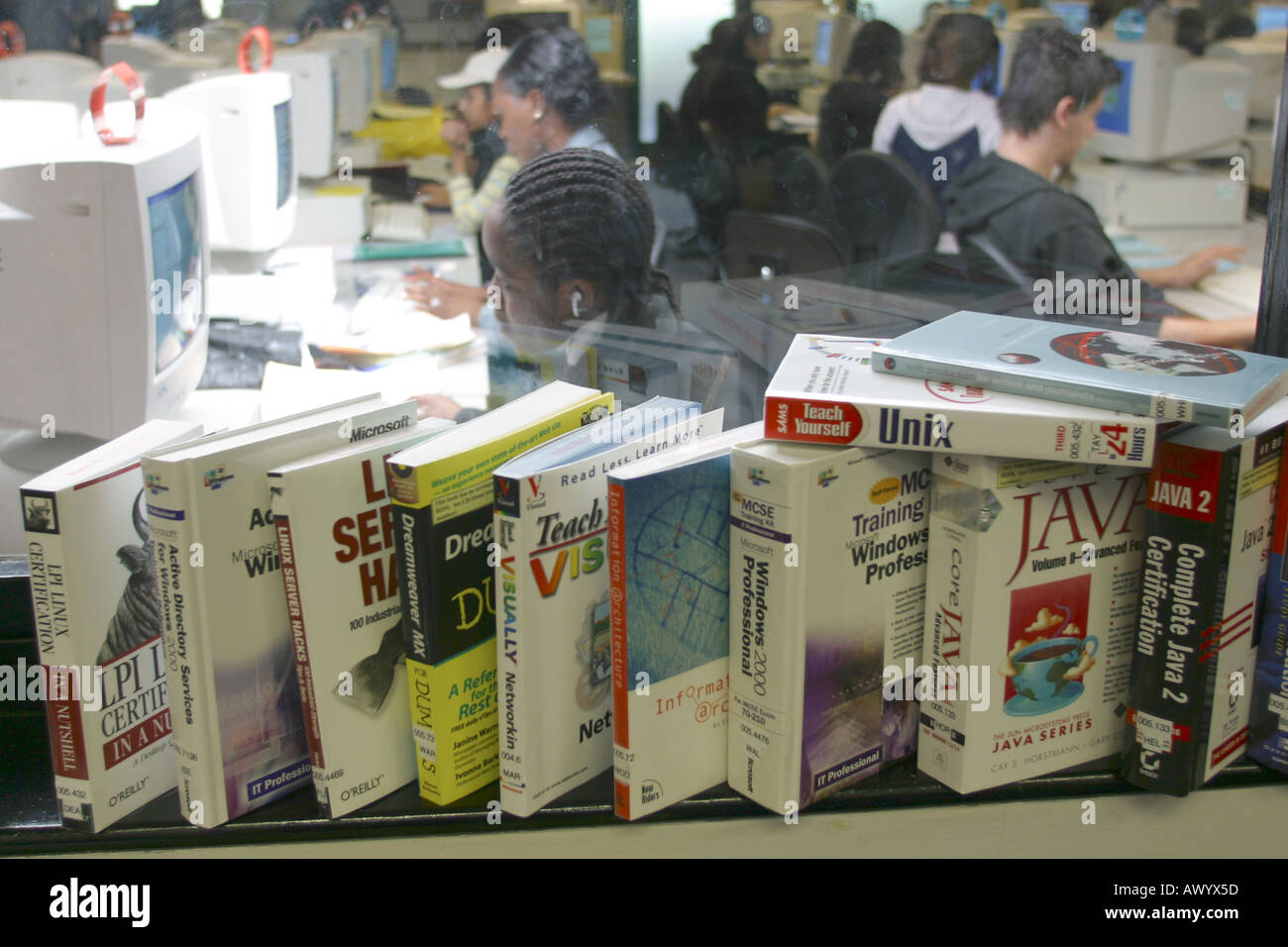 Row of Computer books in 6th form college library Stock Photo - Alamy