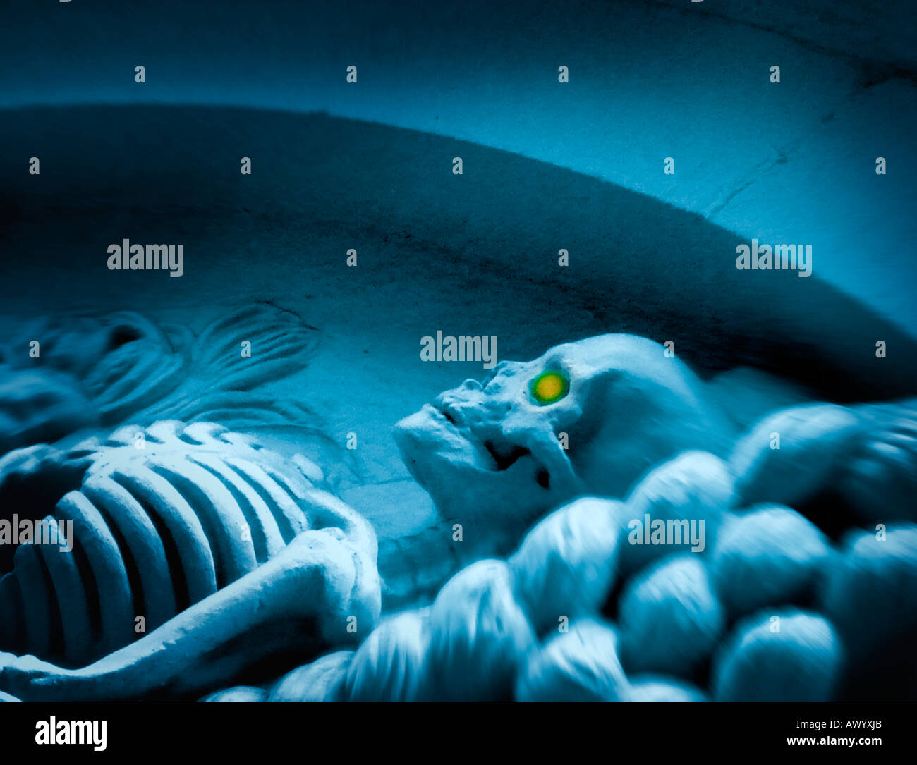 reclining skeleton carving Stock Photo - Alamy
