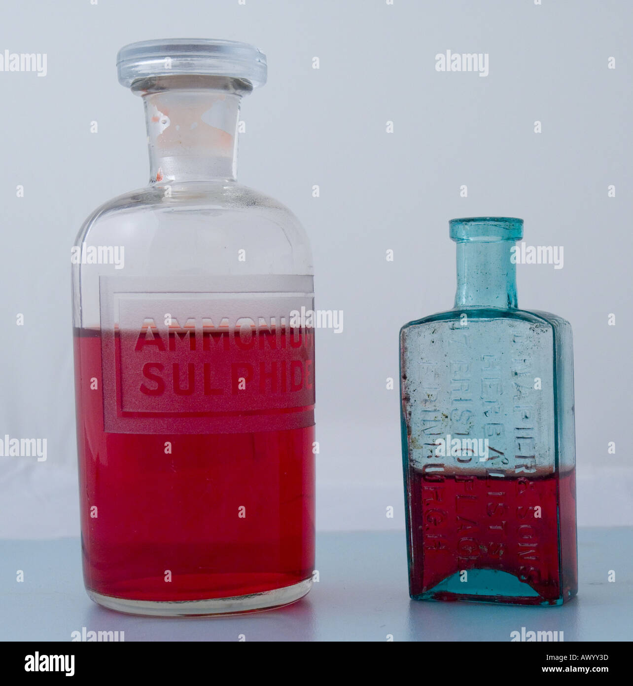 Apothecary bottles containing red liquid Stock Photo - Alamy