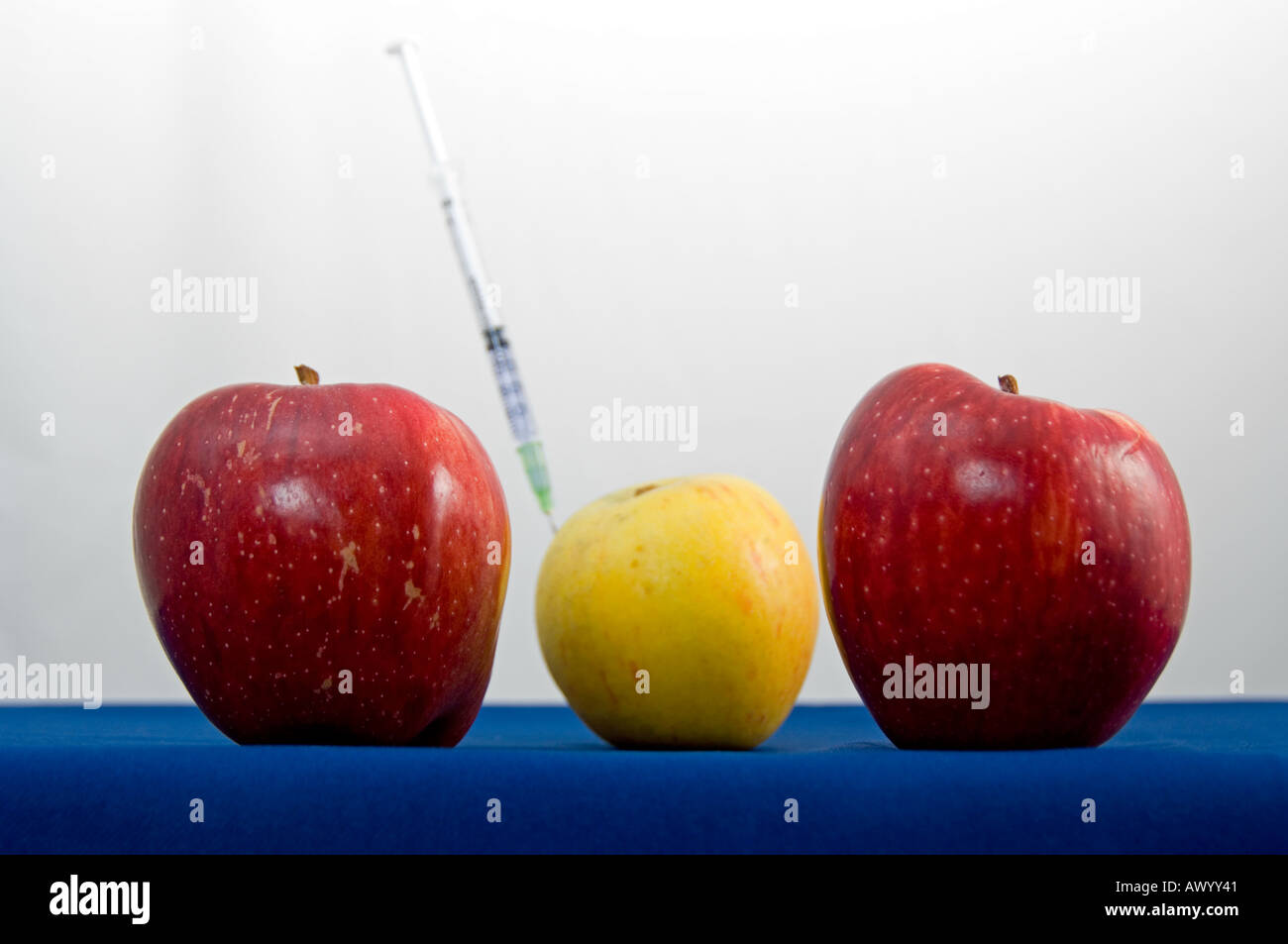 Apple fruit health healthy unhealthy syringe drug hi-res stock ...