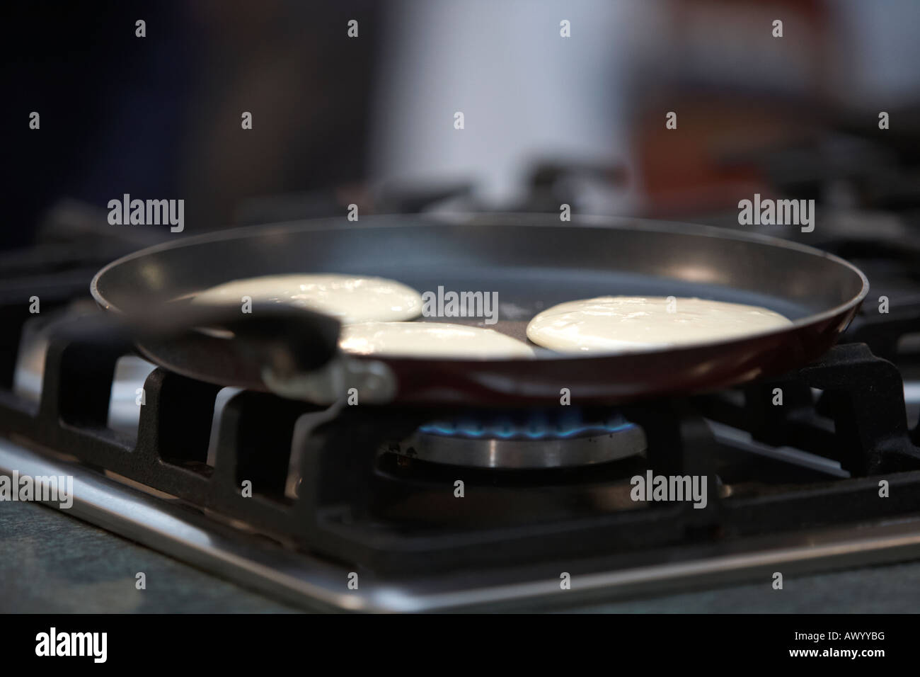 pan on a gas cooker hob cooking traditional irish pancakes Stock Photo ...