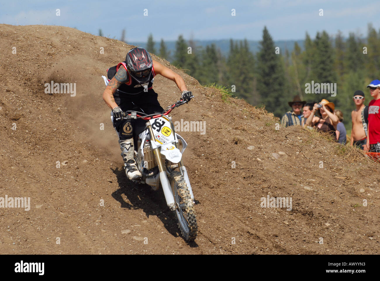 Motocross Rider on the dirt ramp Stock Photo - Alamy
