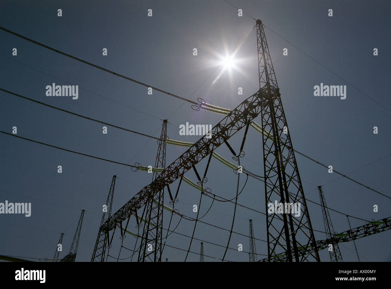 High tension electric posts Stock Photo - Alamy