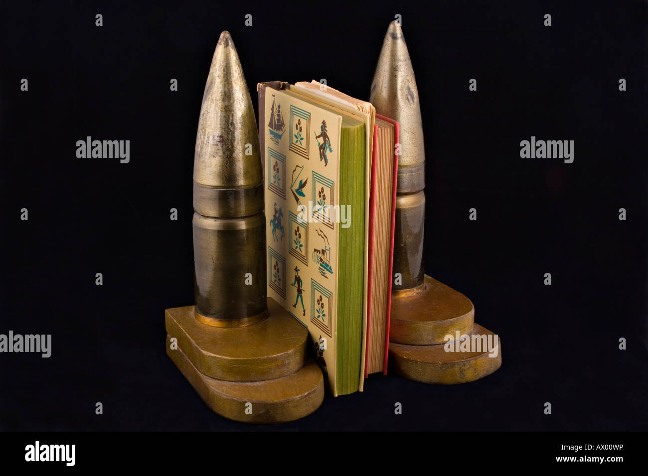 Two spent World War I shells hold old books Stock Photo - Alamy