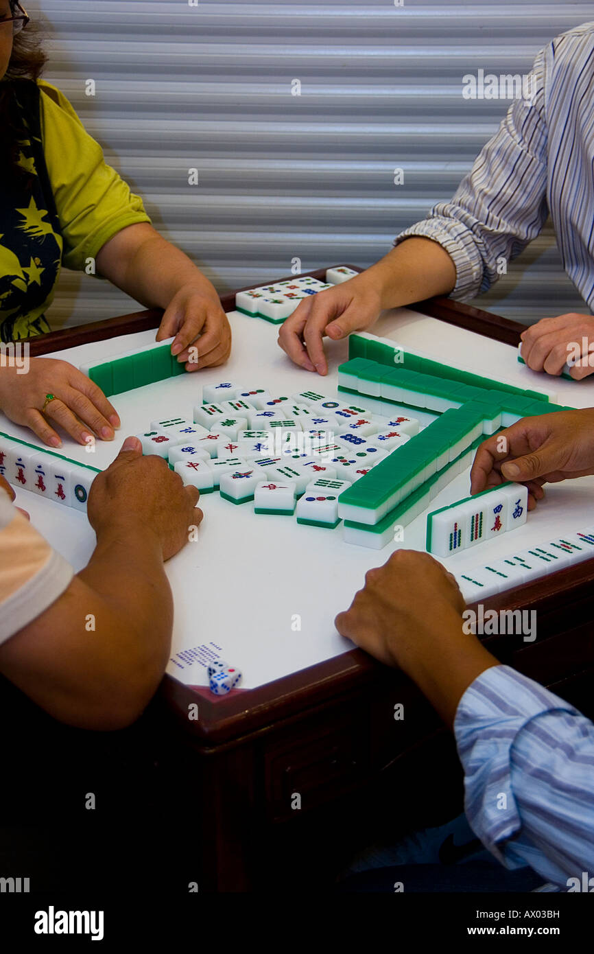 Chinese man playing mahjong hi-res stock photography and images - Alamy