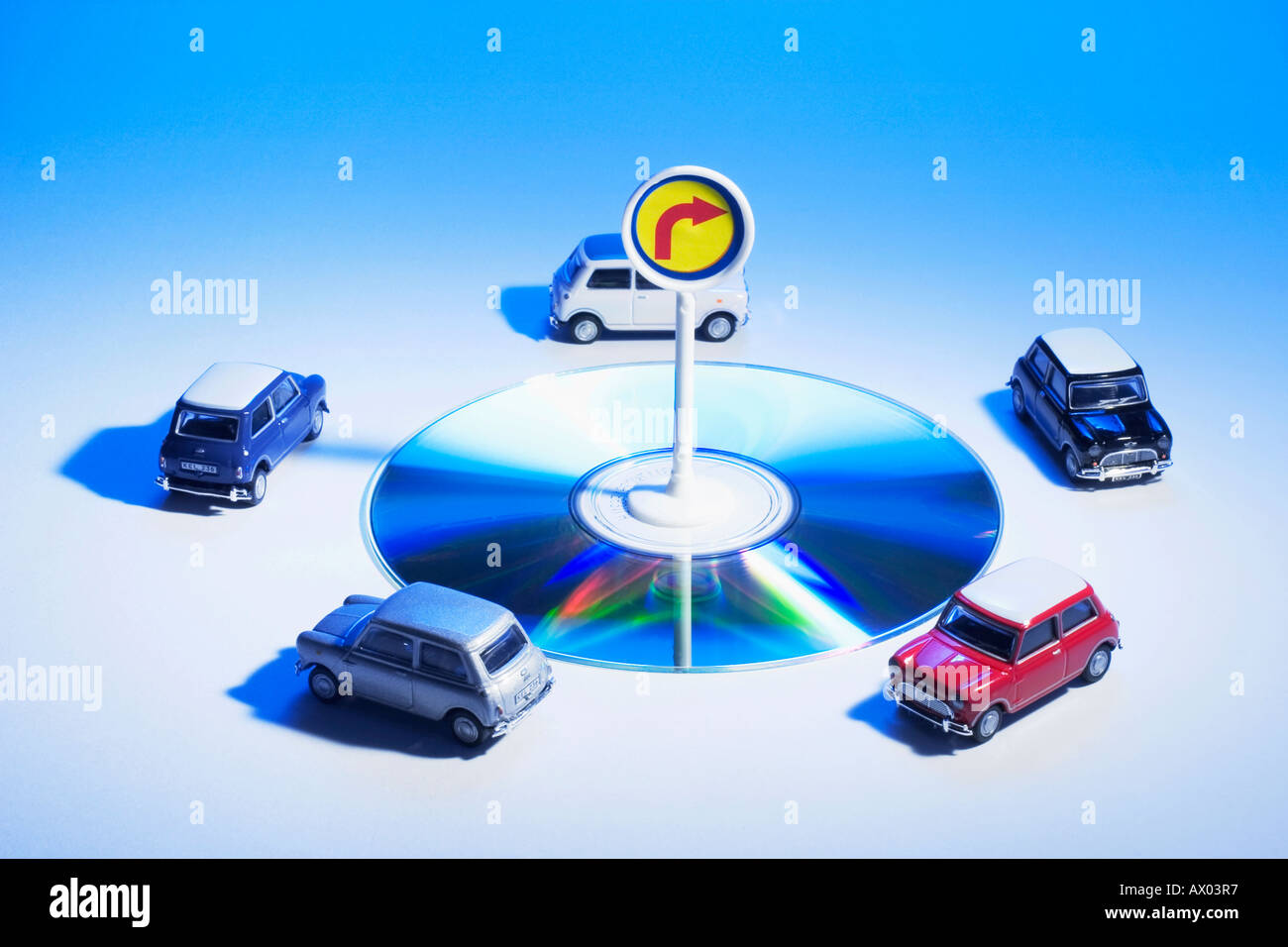 Miniature Cars with Traffic Sign around CD Stock Photo - Alamy